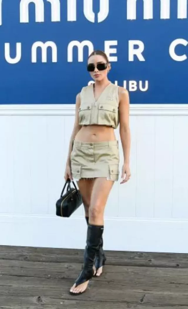 Miu Miu Eyewear Run­way Frame­less Sun­glass­es worn by Olivia Culpo at ...