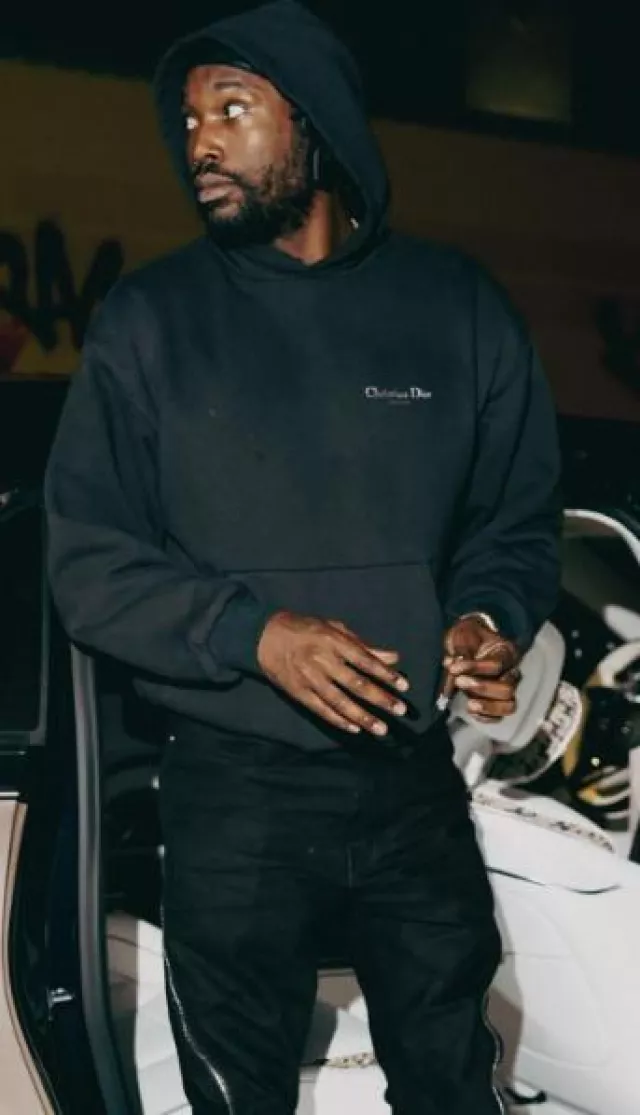 Dior Faded Black Distressed Couture Hoodie worn by Meek Mill on the ...