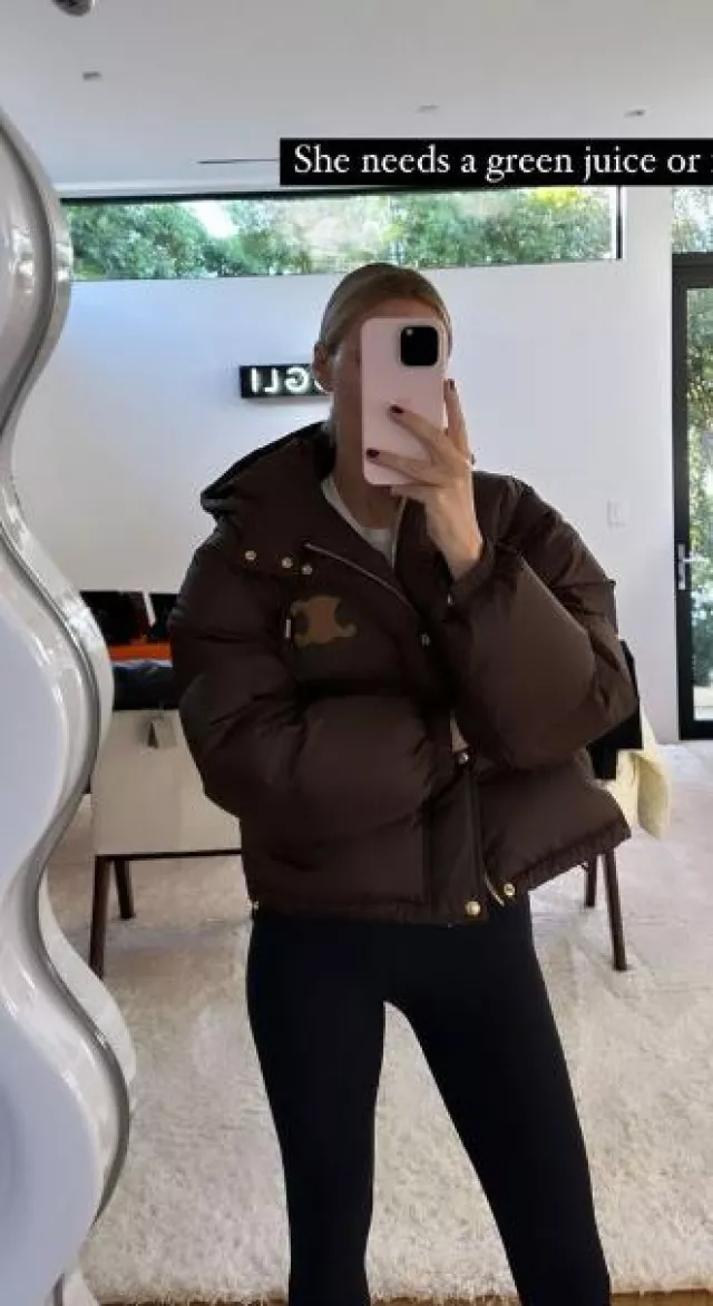 Celine Triomphe Cropped Down Jacket in Lightweight Nylon Chocolate worn by Morgan Stewart on her ...