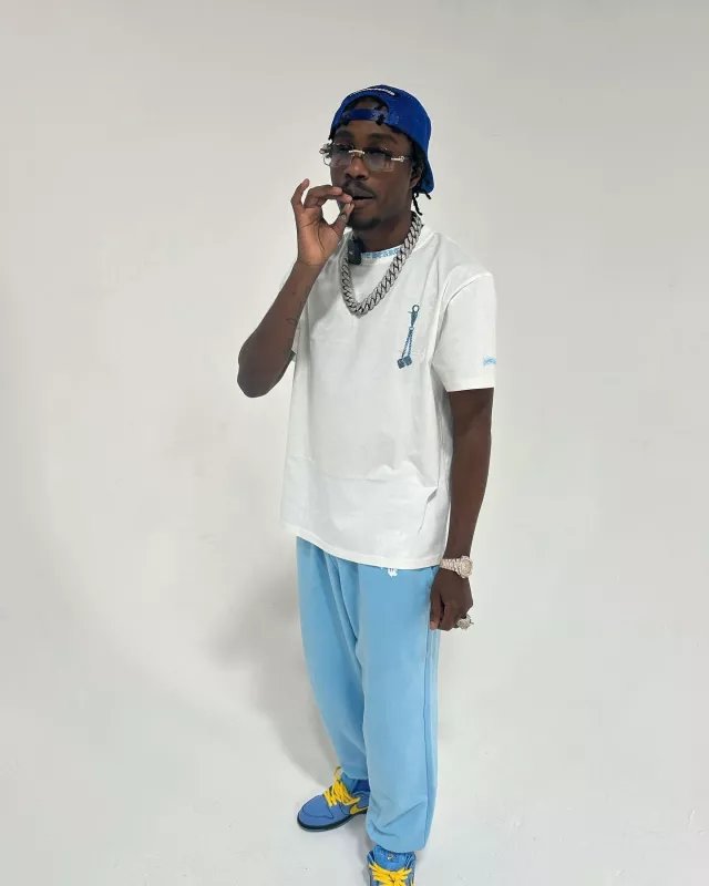 Chrome Hearts Light Blue Floral Dagger Sweatpants worn by Lil Tjay on ...