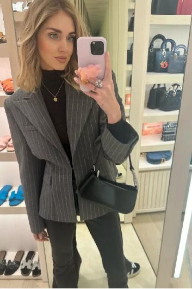 Chiara Ferragni Logo Debossed Shoulder Bag worn by Chiara Ferragni on ...