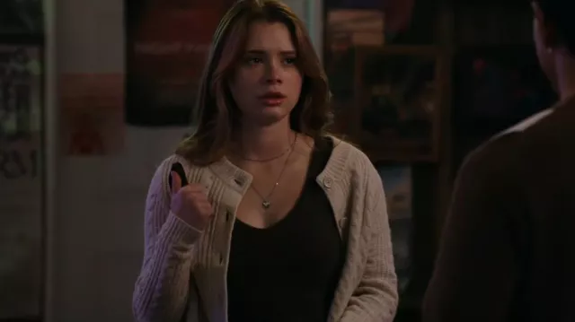 Reformation Foret Ca­ble Knit Cardi­gan worn by Stella Walker (Violet Brinson) as seen in Walker ...