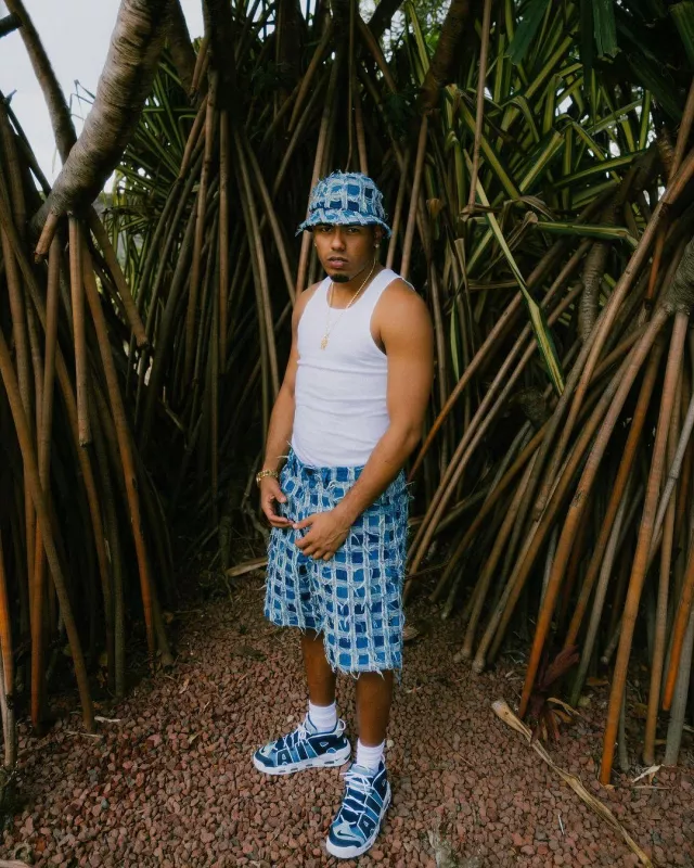 Supreme Blue Square Patchwork Denim Shorts worn by Myke Towers on the ...