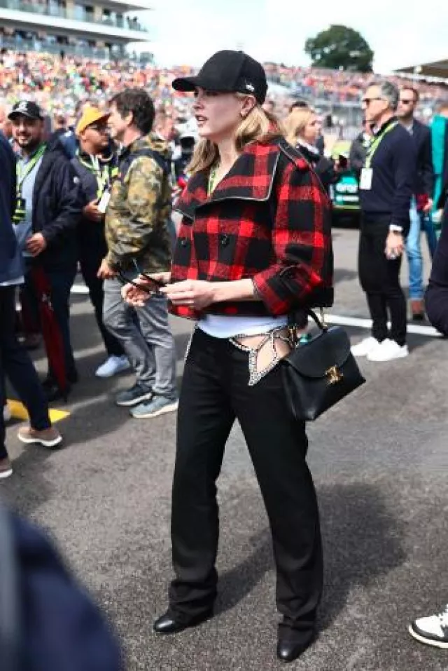 Celine Medium Nino Bag In Supple Calfskin worn by Cara Delevingne at F1 ...