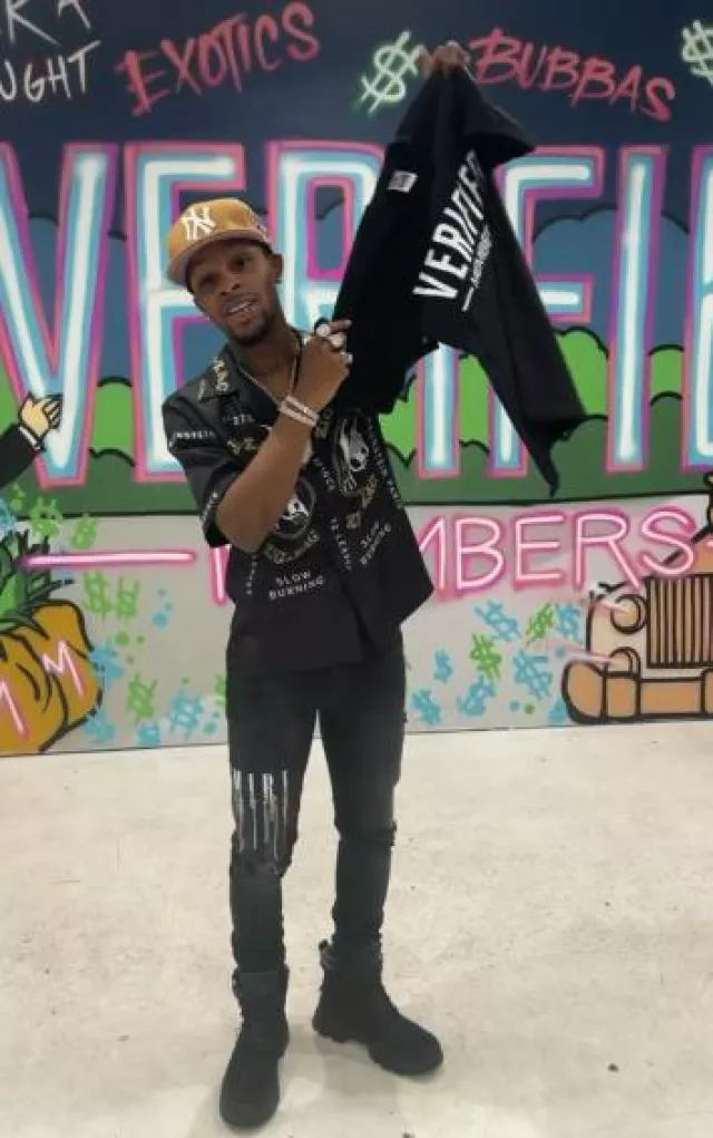 Amiri Aged Black & Paint Drip 'Core Logo' Jeans worn by Toosii on the ...