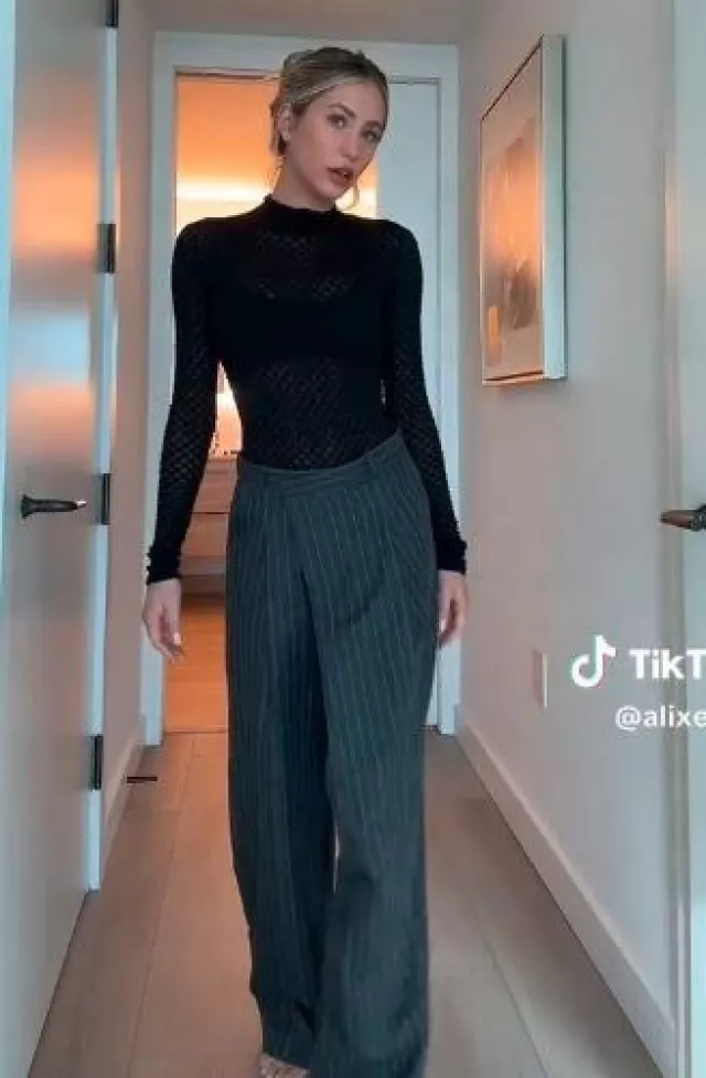 Frame Lace Mesh Turtleneck Blouse worn by Alix Earle on her Tiktok on ...