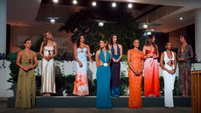 We Wore What Green Halter Ruffle Maxi Dress worn by Jessica Edwards as ...