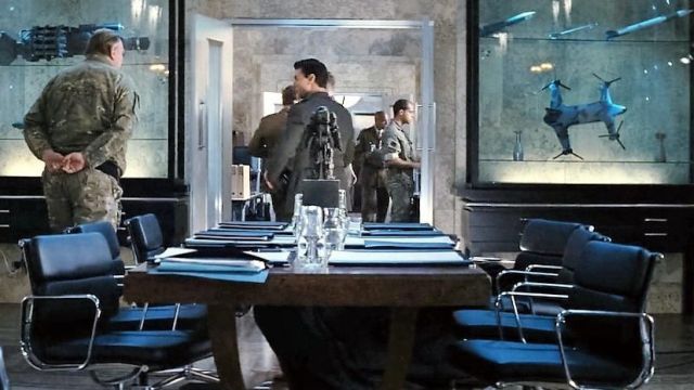 The armchairs Eames at the HQ of general Brigham (Brendan Gleeson) in ...