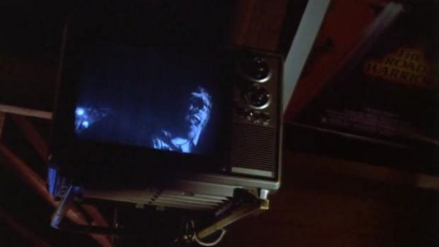 The poster for the movie Mad Max, seen in the room of Billy (Zach ...