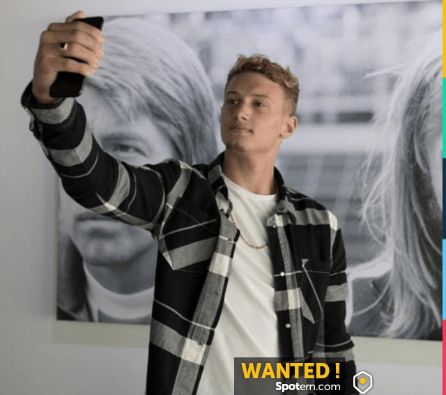 The black shirt plaid from Michael Cuisance at his signature with ...