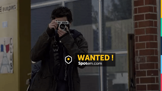 The strap of the camera used by Peter Parker (Andrew Garfield) in the ...