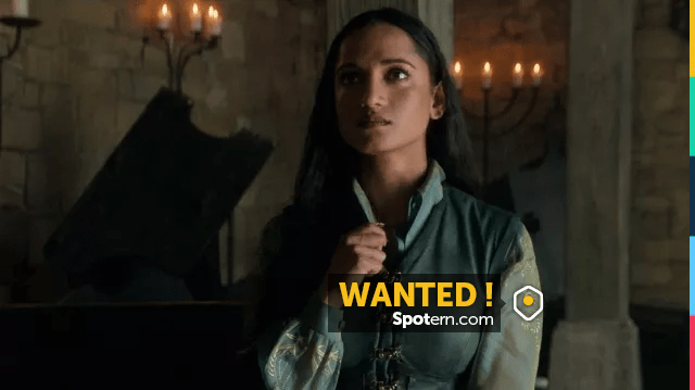 The embroidered green shirt worn by Inej Ghafa (Amita Suman) in Shadow and Bone: The Grisha Saga ...