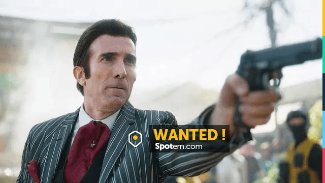 Striped suit jacket worn by Gideon Van Der Koy (Sharlto Copley) as seen ...