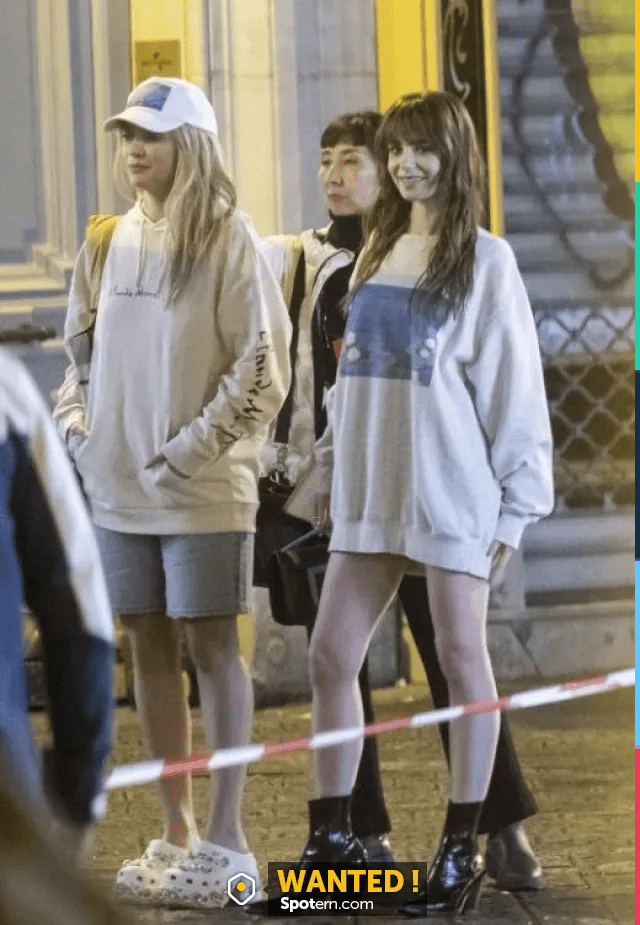 Embellished Crocs in white worn by Camille Razat on the set of Emily in ...