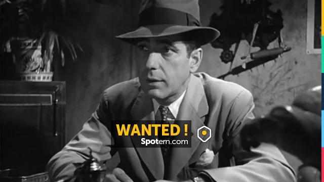 Casablanca movie wardrobe: Humphrey Bogart aka Bogie is wearing suit and hat to portray Rick ...