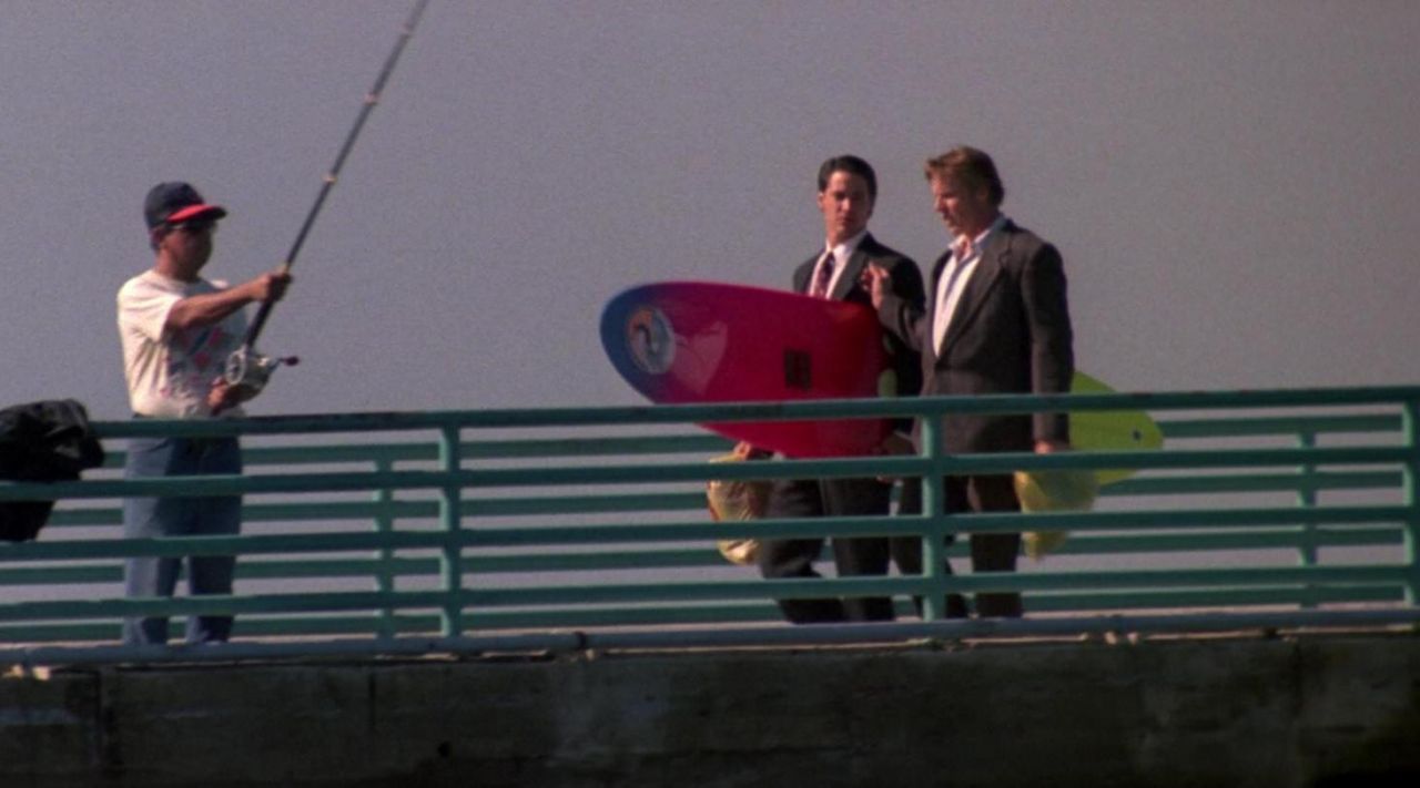 The surf board pink and yellow Johnny Utah (Keanu Reeves) in Point ...