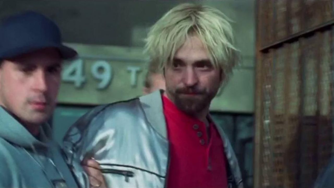 Reflective silver jacket worn by Connie Nikas (Robert Pattinson) as ...