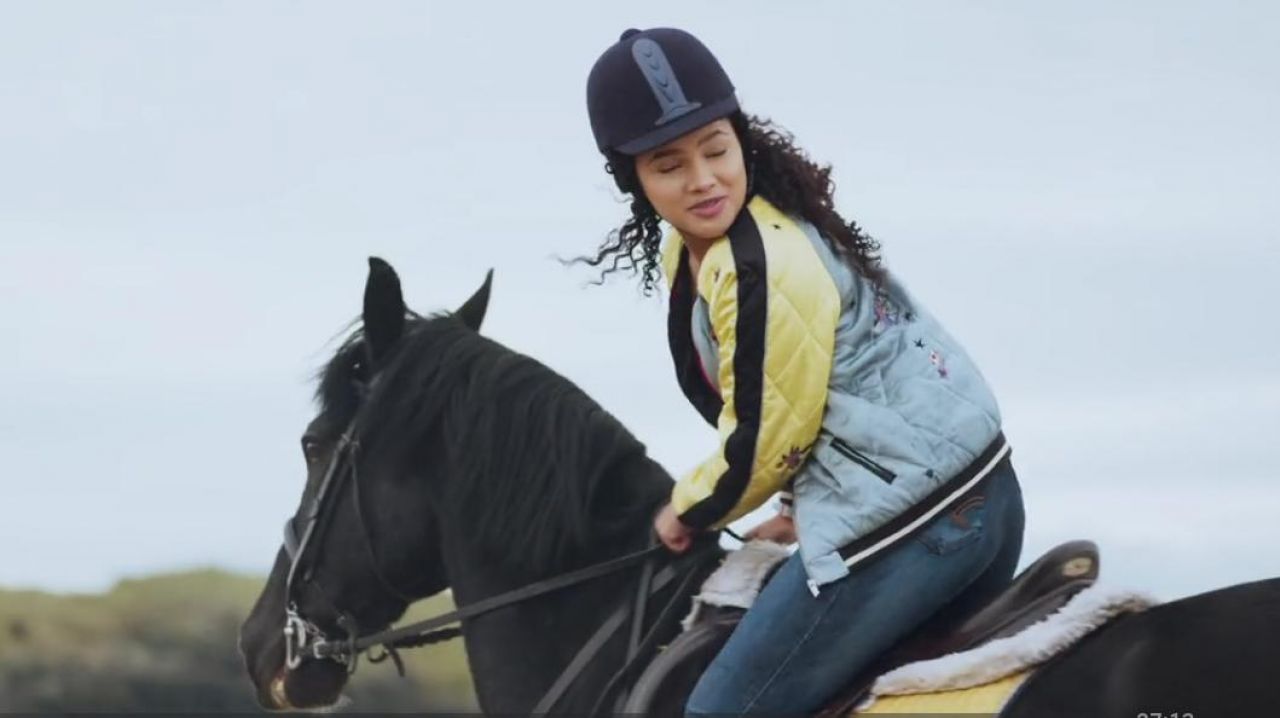 The jacket in bomber blue and yellow Zoe (Jaylen Barron) in Zoe & Raven ...