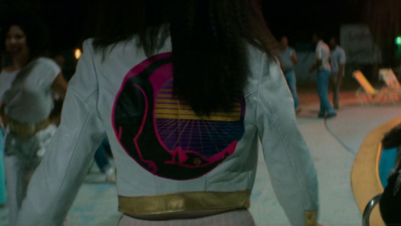 blue and gold Lucky jacket worn by Melanie Rosen (Jackie Tohn) & Jenny ...