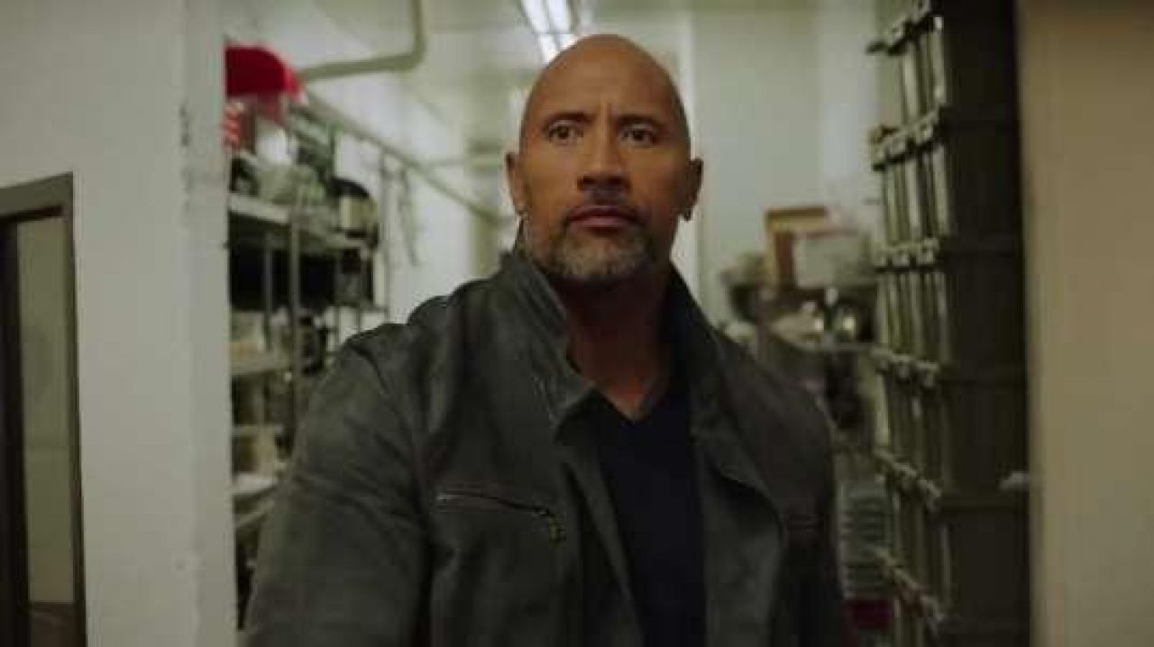 Suede jacket worn by Spencer Strasmore (Dwayne Johnson) as seen in ...