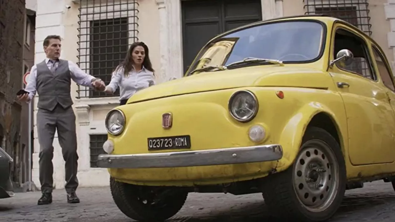 Yellow Fiat 500 vintage car driven by Ethan Hunt (Tom Cruise) in ...