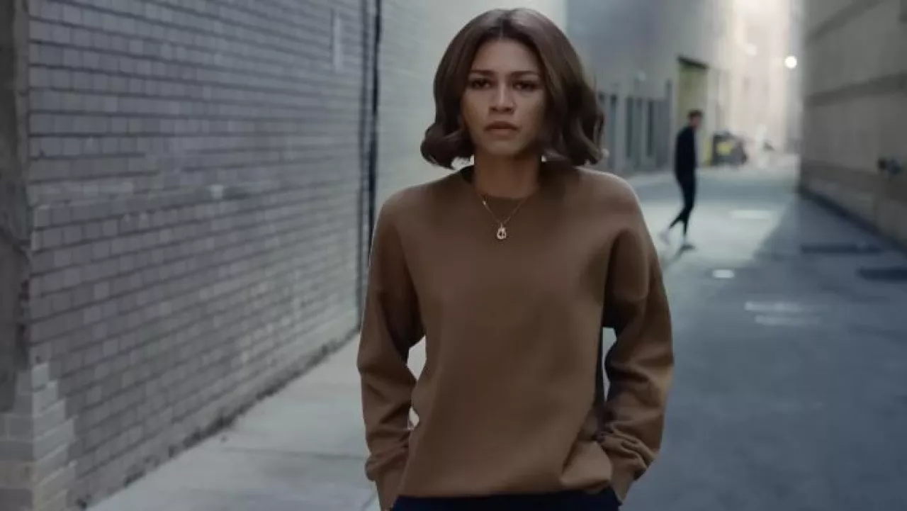 Gold necklace pendant worn by Tashi (Zendaya) as seen in Challengers ...