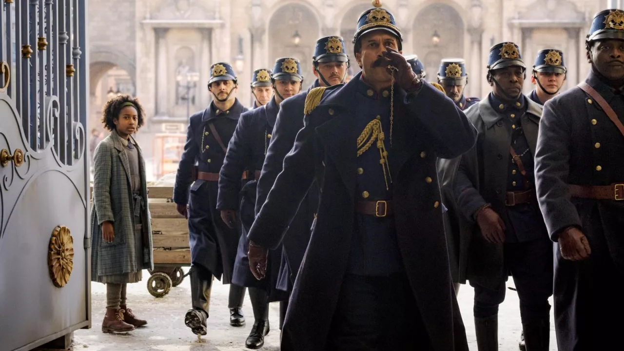 Plaid coat worn by Noodle (Calah Lane) as seen in Wonka | Spotern