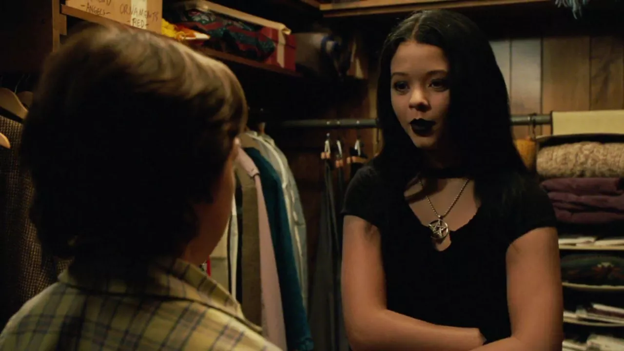 Black notched T-shirt worn by Goth Girl (Sasha Pieterse) in Good Luck ...