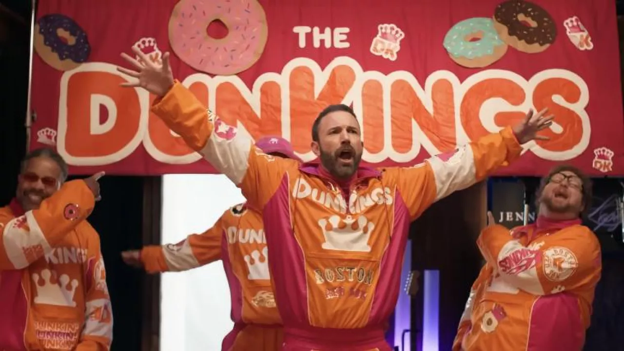 ‘The DunKings’ orange and pink track jacket worn by Ben Affleck as seen ...