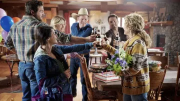 Yellow printed cardigan worn by Isabel McMurray (Nancy Travis) as seen ...