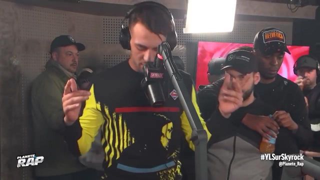 The black sweater, and yellow worn by YL in his video Favelas on Planet ...