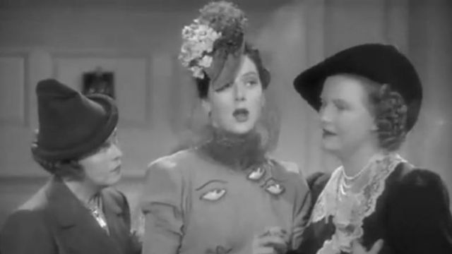 Sweater with eyes worn by Mrs. Howard Fowler - Sylvia (Rosalind Russell ...