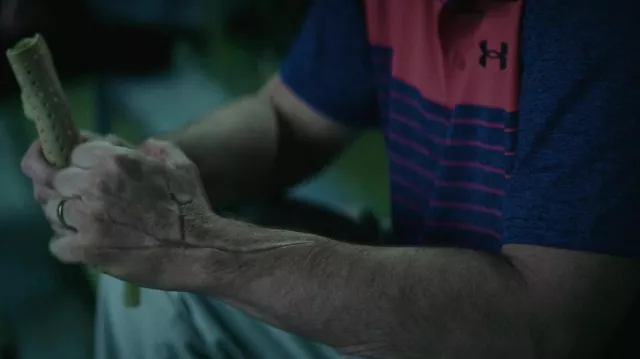 Striped Blue Pink Under Armour Polo Shirt worn by Stanley Sugerman ...