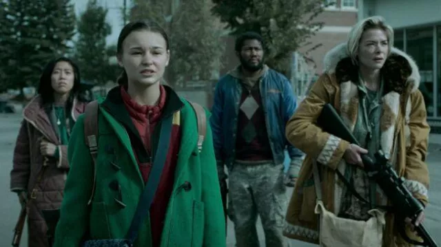 Green coat of Anna (Zoe Marlett) as seen in Black Summer TV series ...