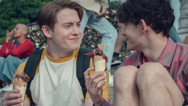 Yellow and white raglan tee worn by Nick Nelson (Kit Connor) as seen in ...