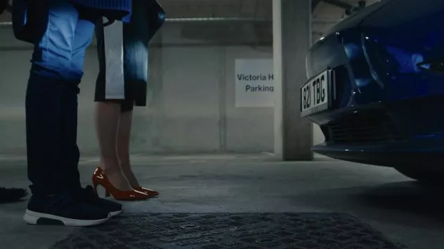 Red pumps worn by Stella Simmons (Lauren Metcalfe) as seen in Control ...