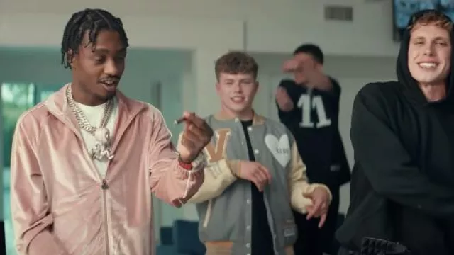 The pink tracksuit worn by Lil Tjay in his Same Friends music video ...
