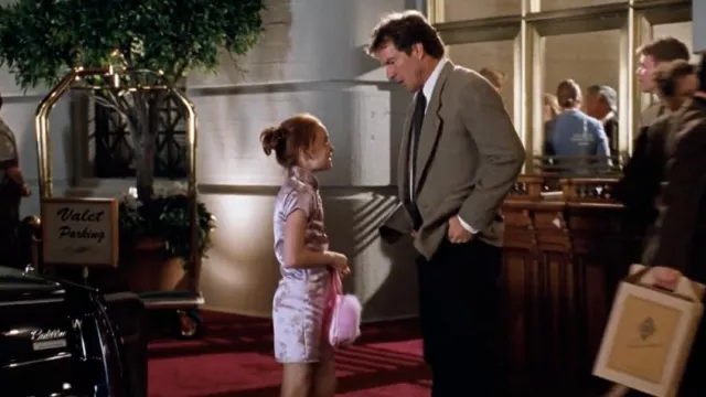 Pink fluffy purse worn by Hallie Parker (Lindsay Lohan) in The Parent Trap | Spotern