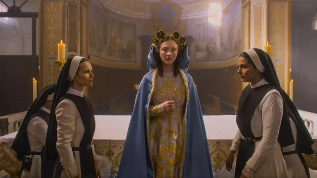 Blue hood cape worn by Cecilia (Sydney Sweeney) as seen in Immaculate ...